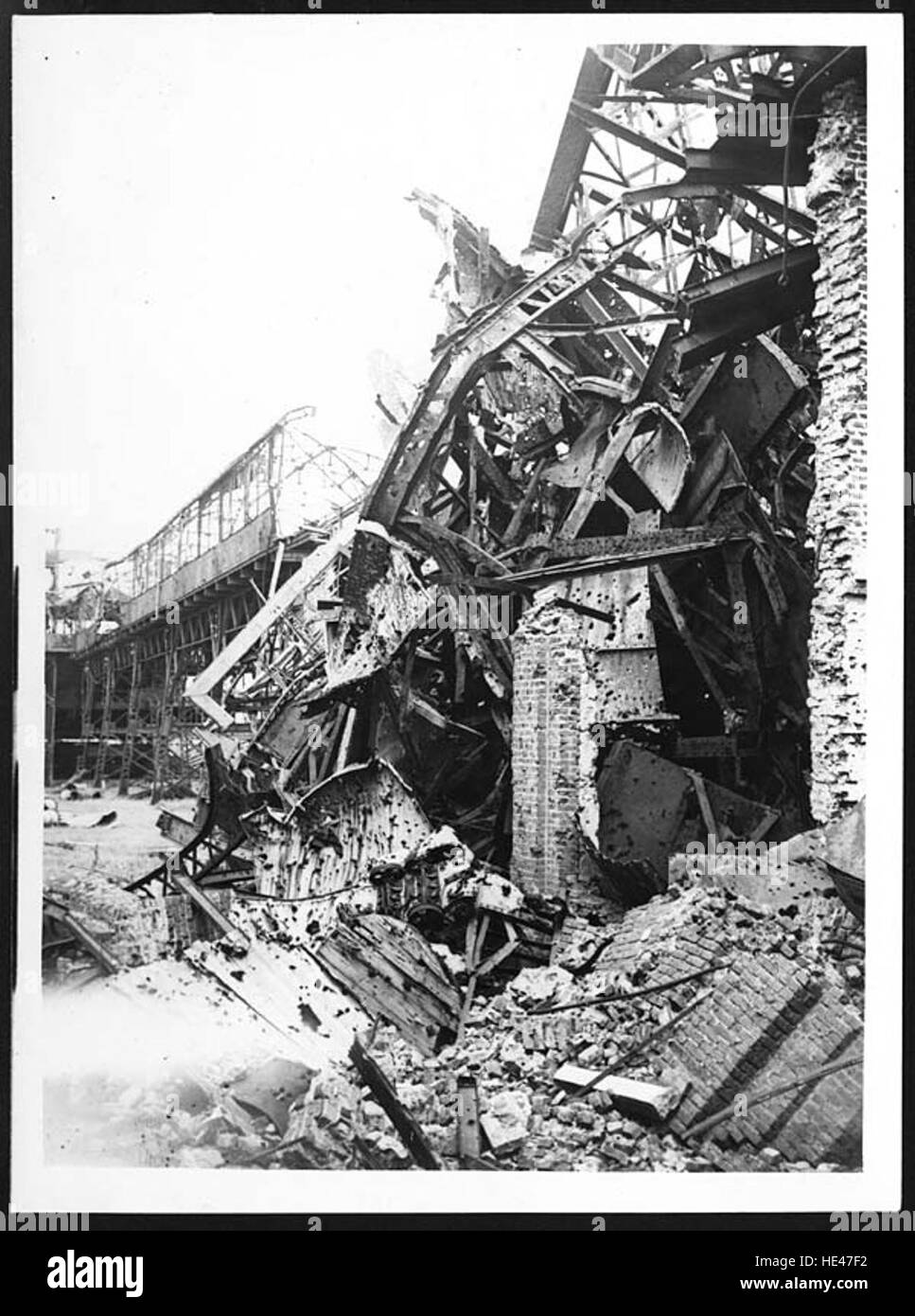 This historical image shows the damage caused by shellfire to a mine ...