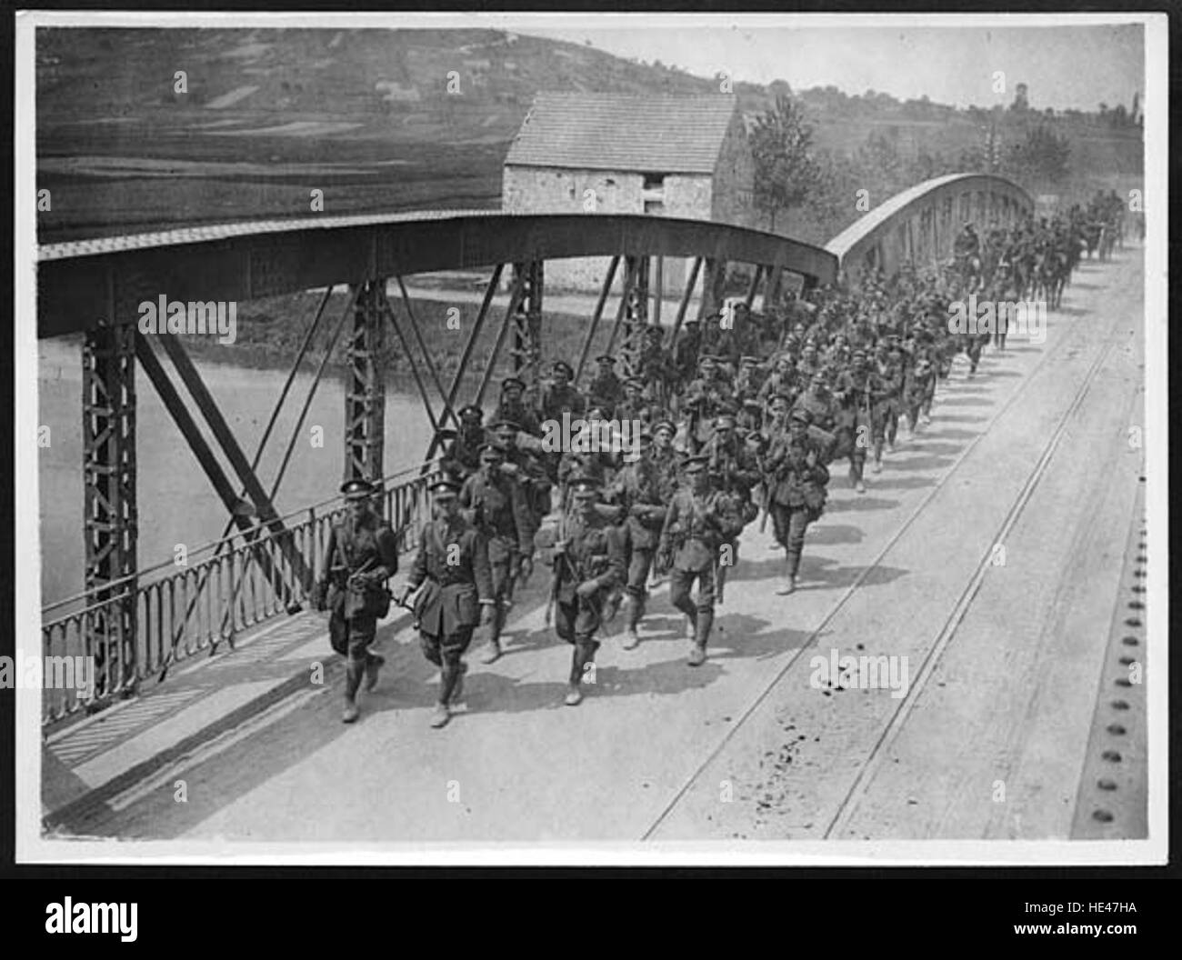 This historic image shows British troops crossing the Marne River ...