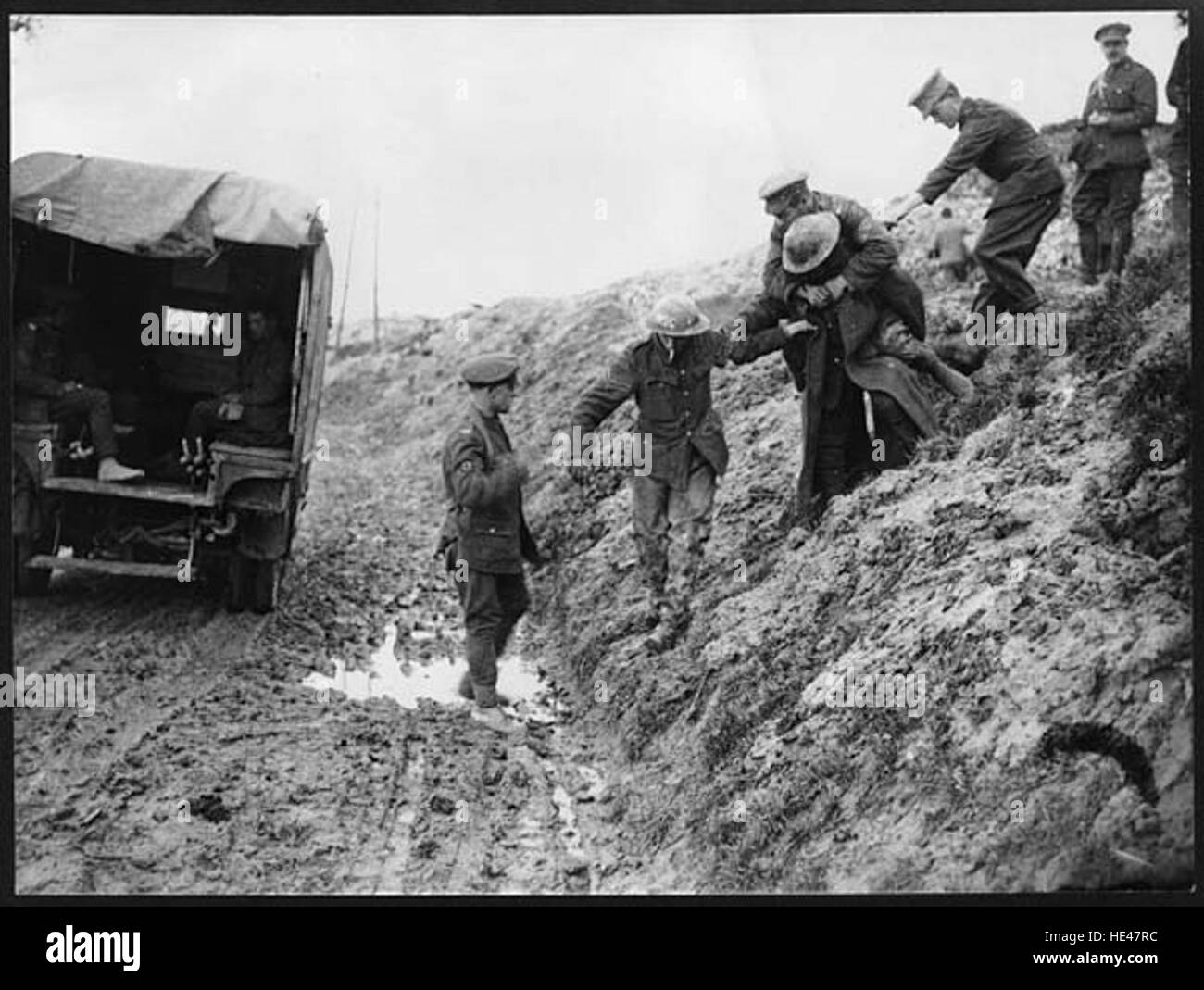 This poignant historical image depicts the urgent care and compassion ...