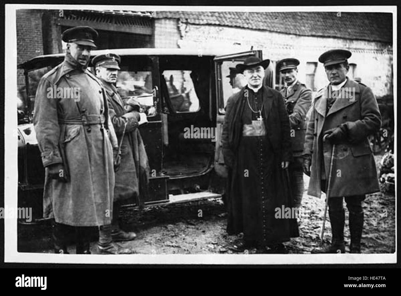 This historical image shows a cardinal arriving to conduct a religious ...