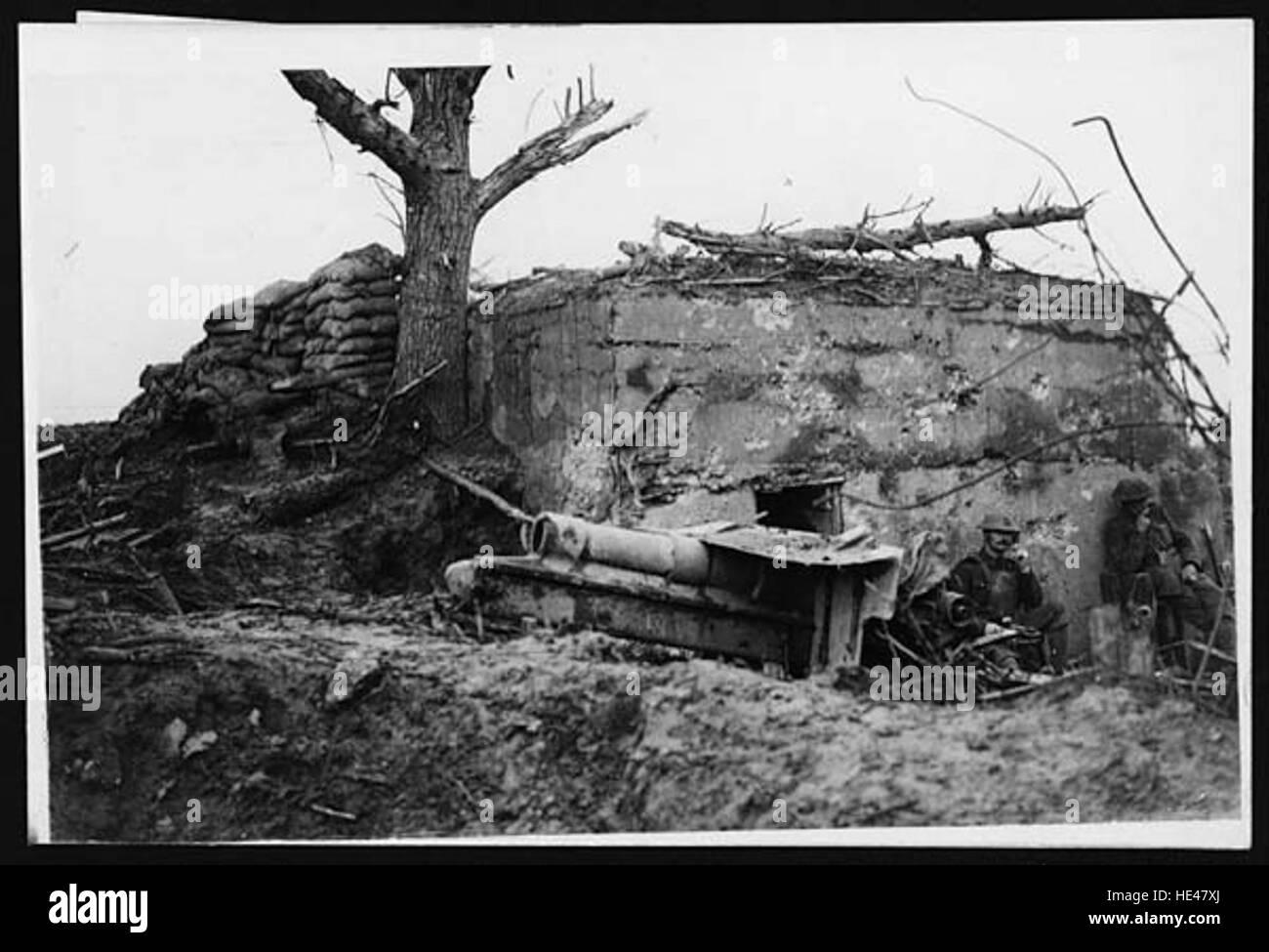 This image shows a massive concrete dugout once used by a German ...