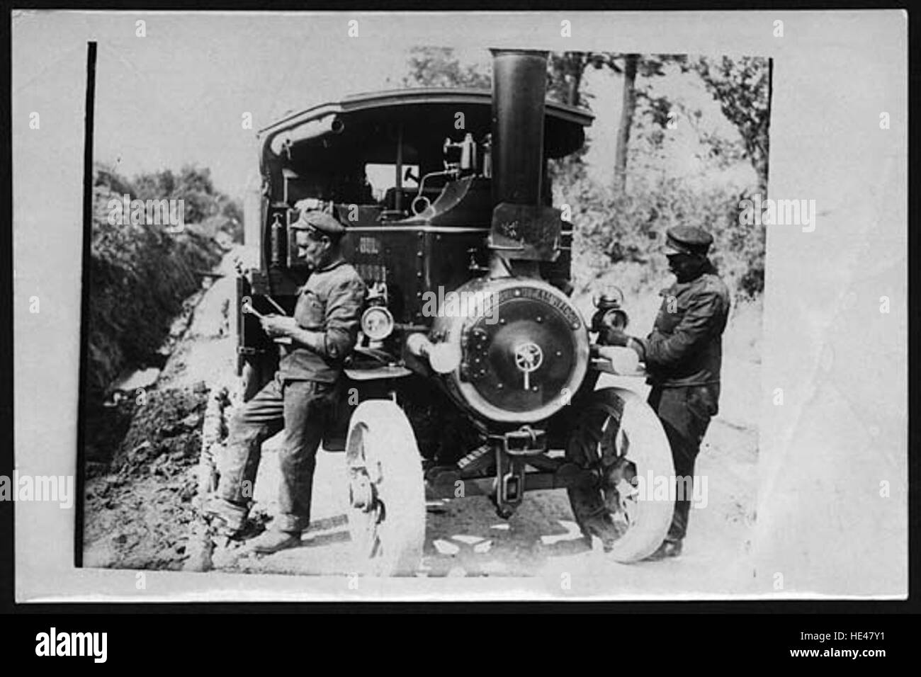 ACS steam engine driver receives news from home Stock Photo - Alamy