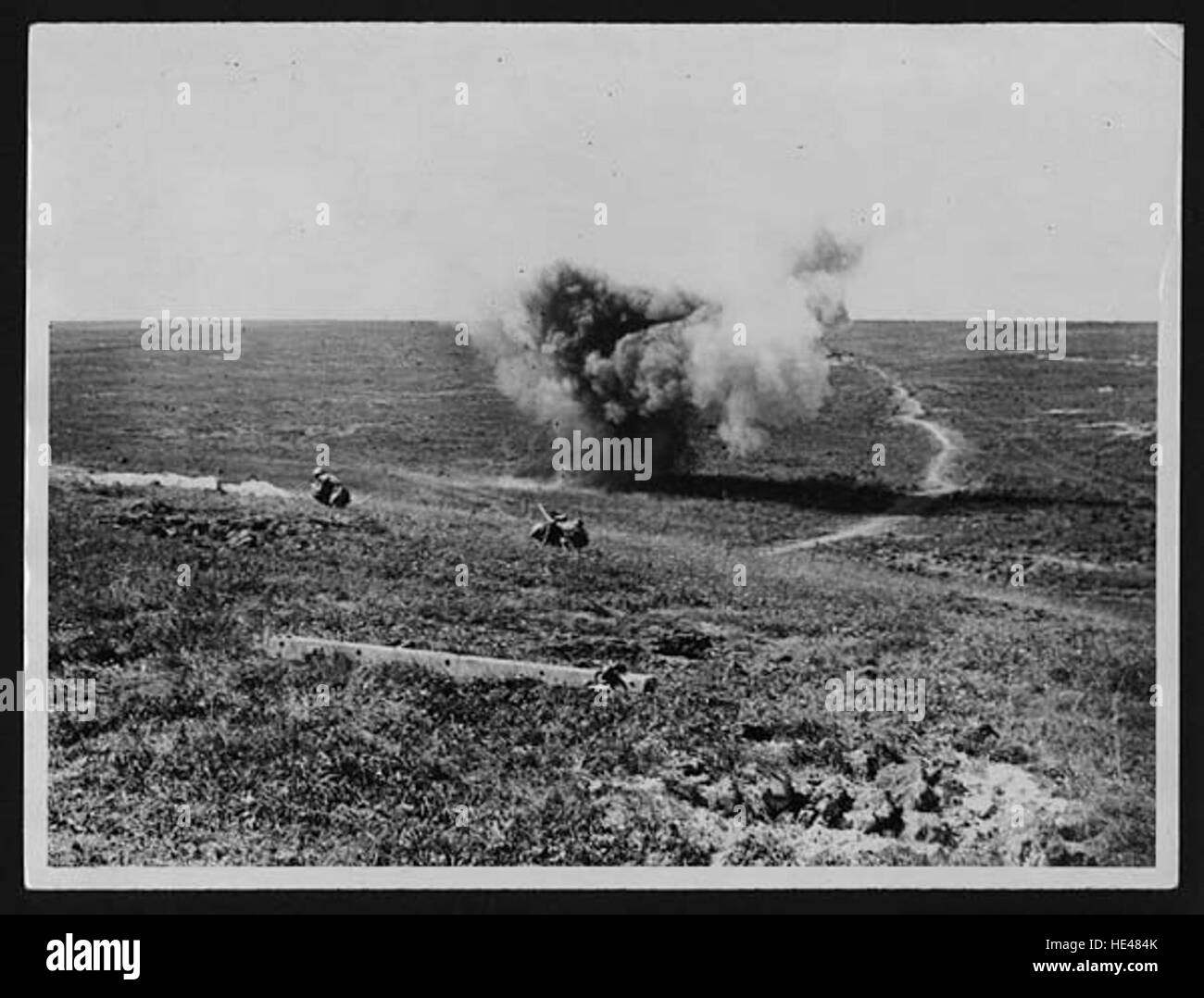 This photograph captures a historic moment from the past, showing a ...