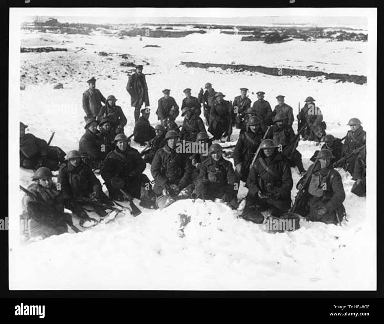 This photograph shows a group of soldiers on the battlefield, capturing ...