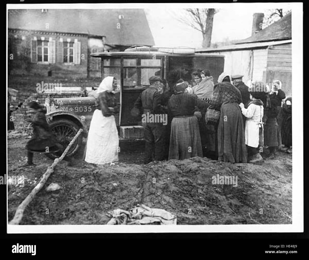This historical image depicts the inhabitants of a newly captured ...