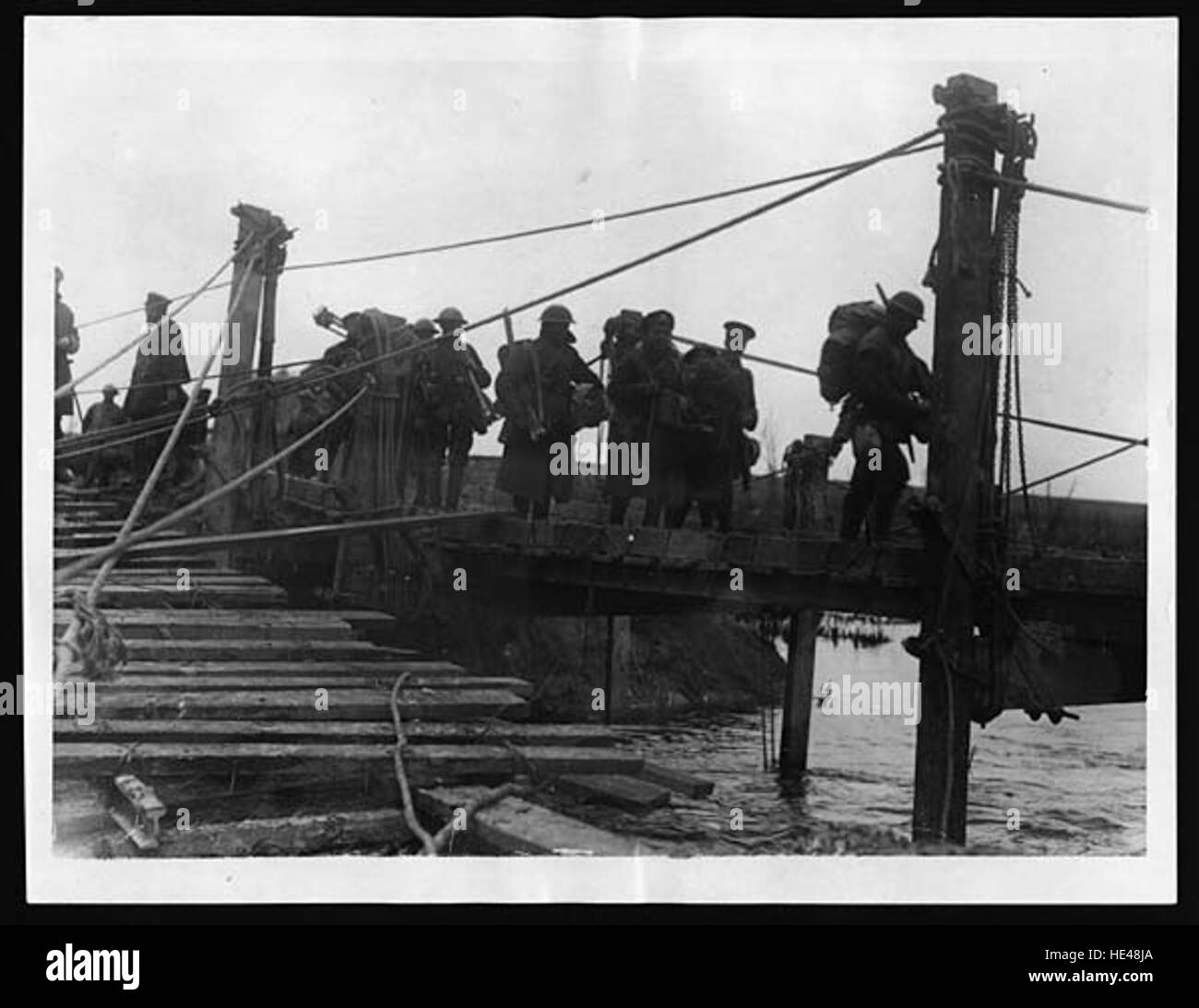 This historic image shows a temporary bridge built by troops over the ...