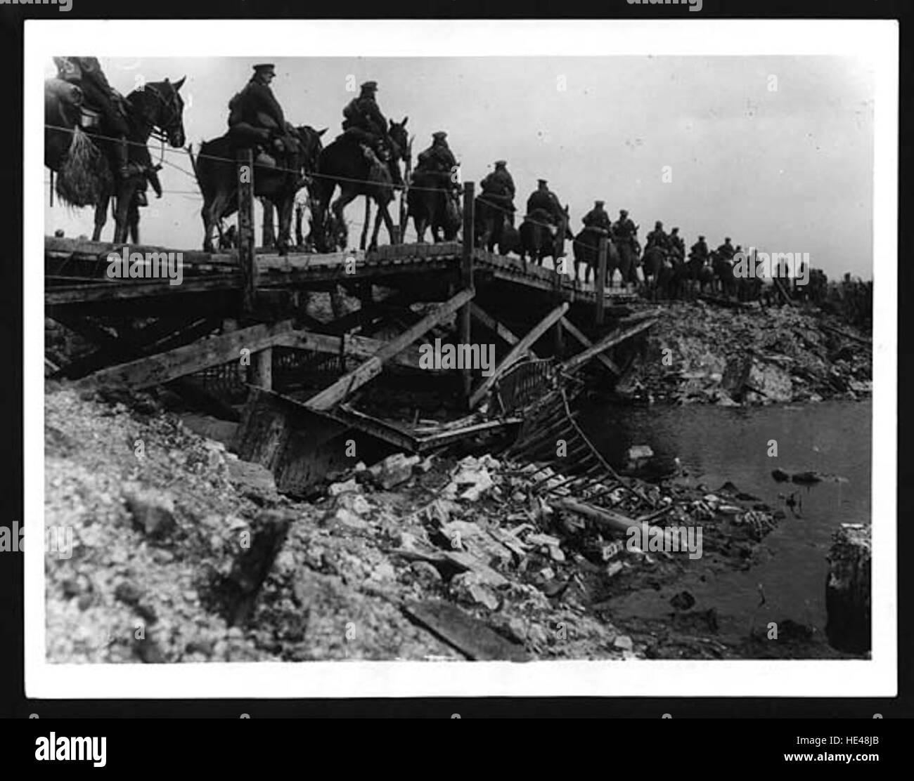 This historical image depicts the German forces destroying bridges as ...
