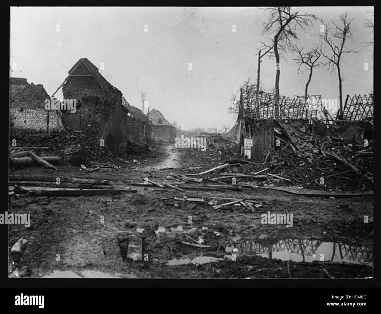 This image captures a moment following an aerial strafing, depicting ...