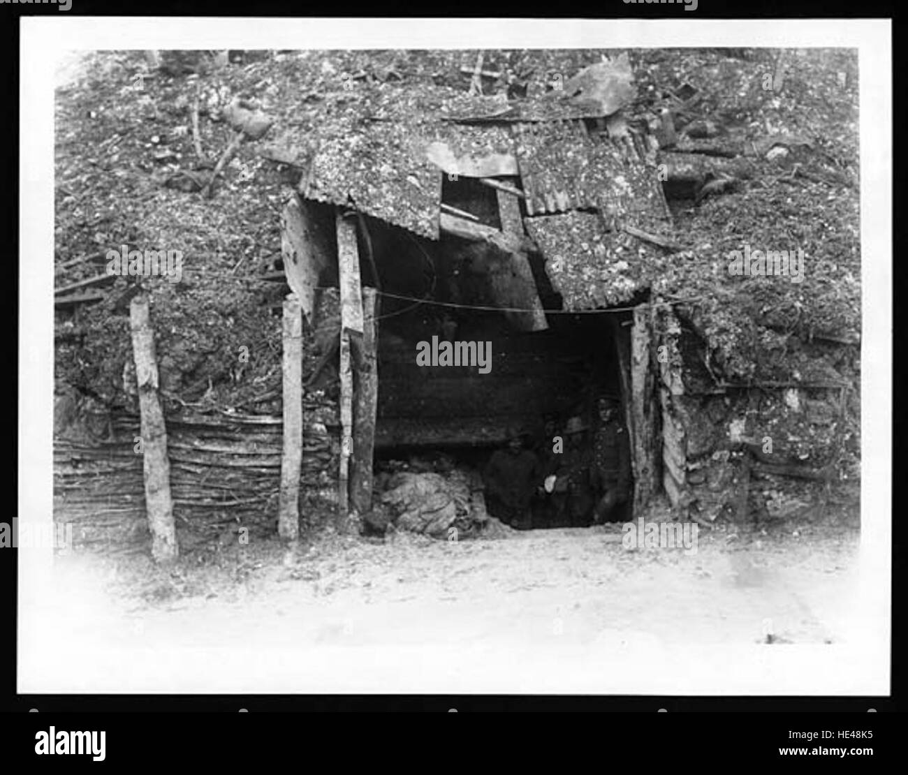 This image likely depicts a captured German dugout, a remnant of ...