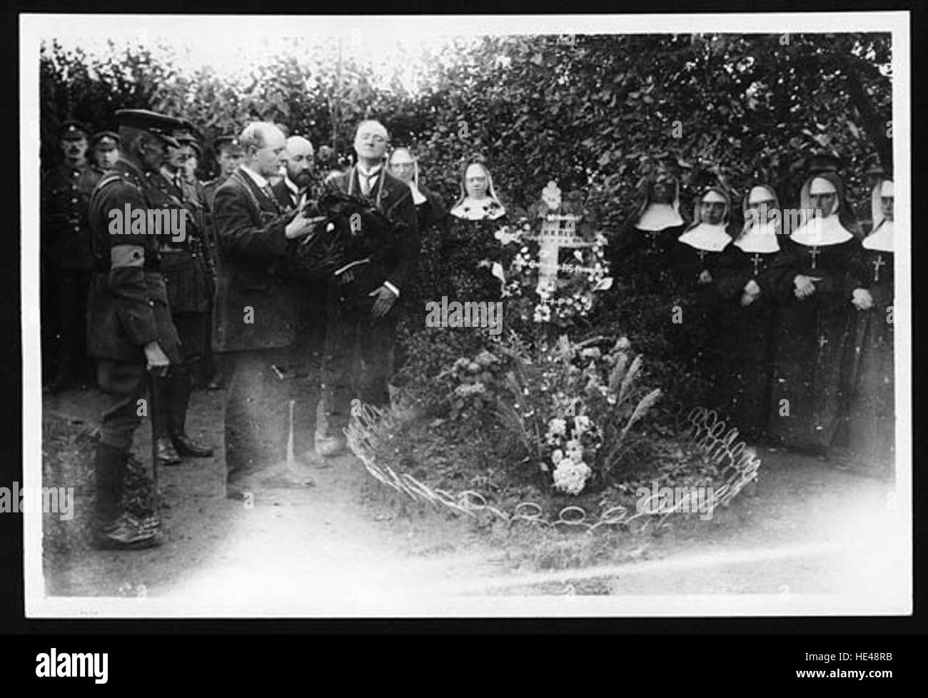 This image captures a historic scene from a ceremonial event, evoking a ...
