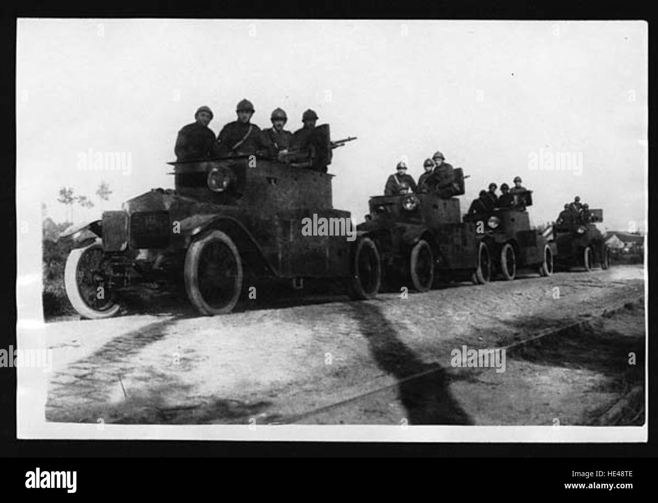 This photograph depicts Belgian armored cars advancing towards the ...