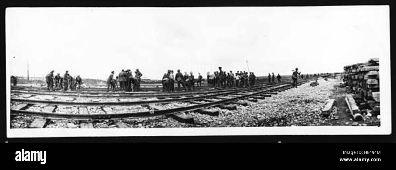 This image depicts the construction of a new railway track ...