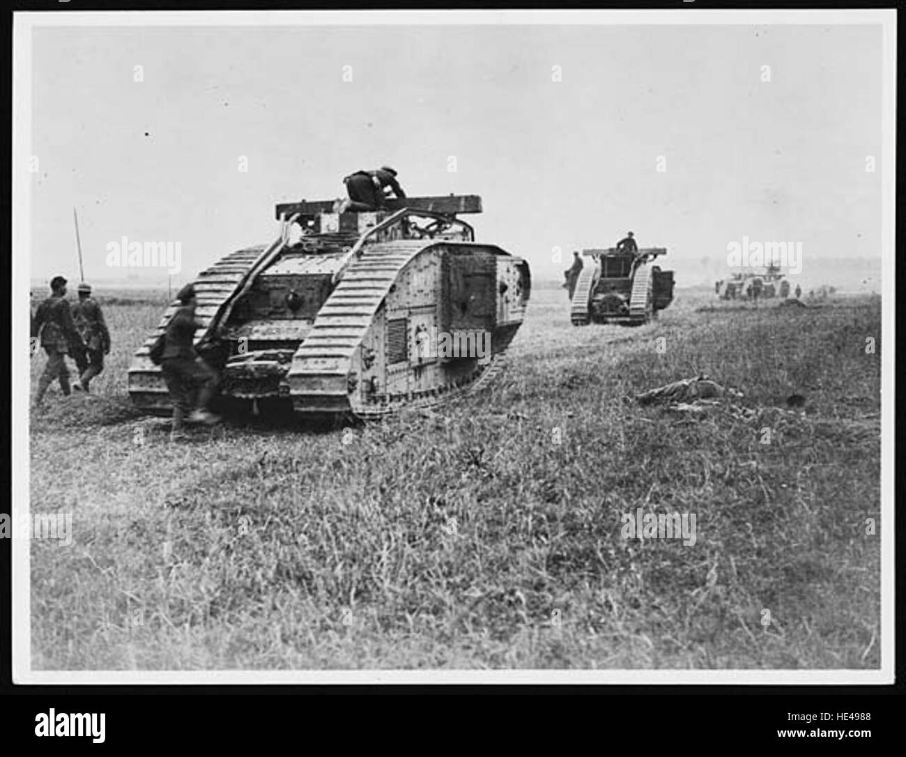 This image, depicting tanks passing over fallen soldiers, evokes the ...