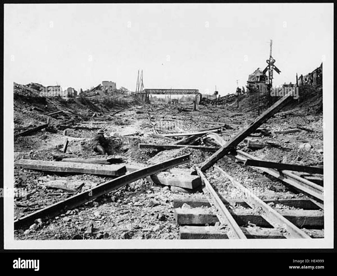 This historic image captures the railway lines near a station ...