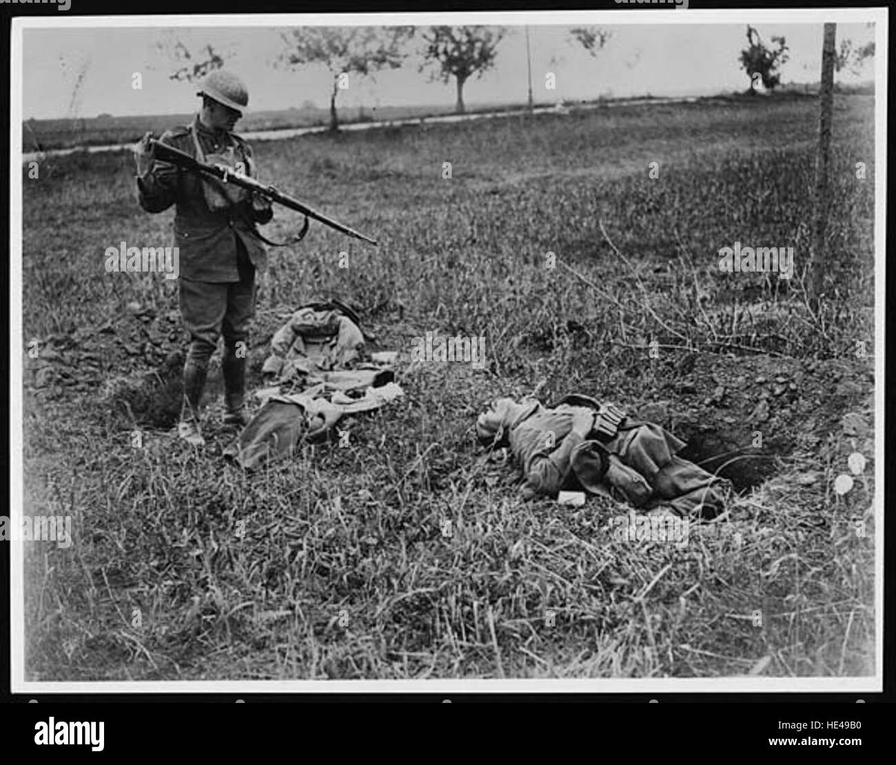 This historical image depicts one of the enemies killed by Canadian ...