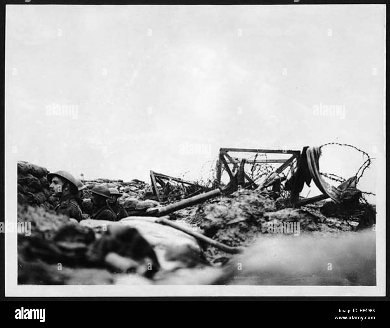 This image captures a front trench, with a Lewis machine gun positioned ...