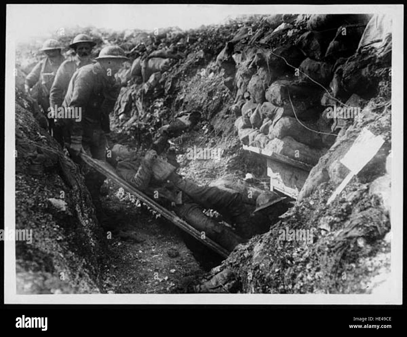 This photograph captures a historical scene from a battlefield, showing ...