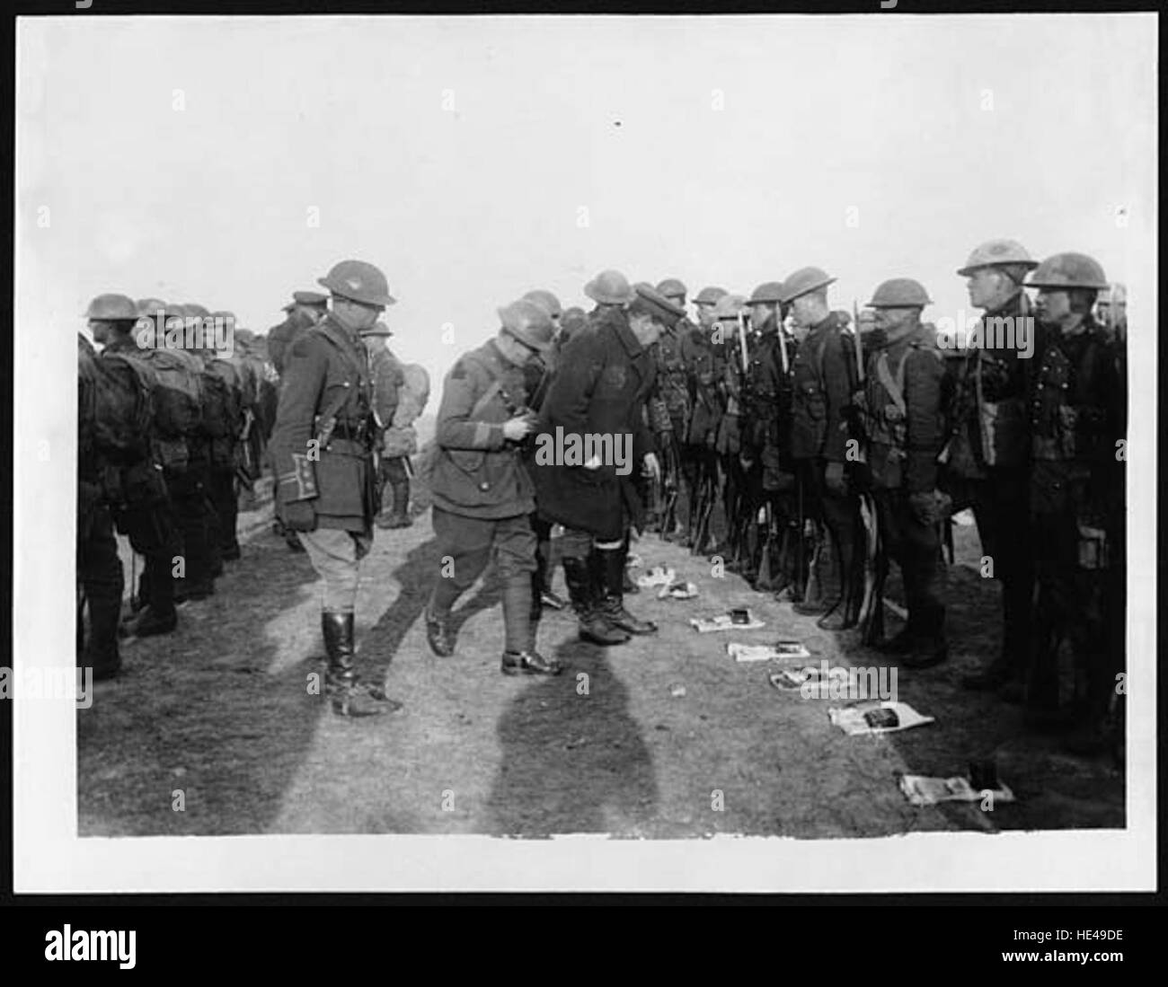 This image captures the inspection of a Canadian battalion, a key ...