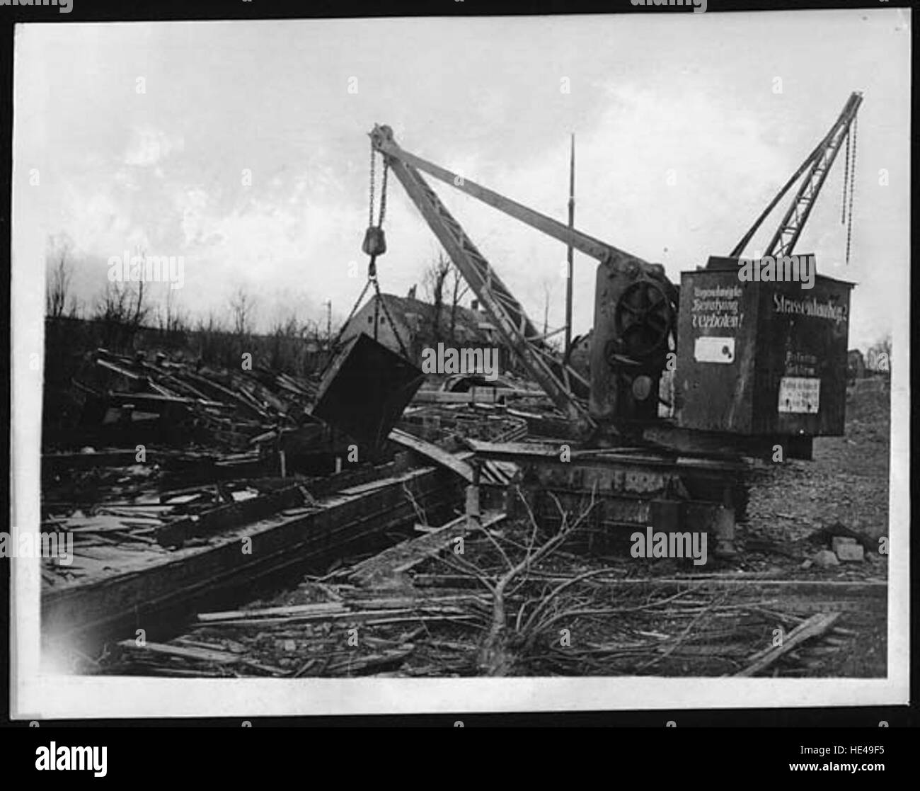 A historical image depicting the destruction of German cranes and ...