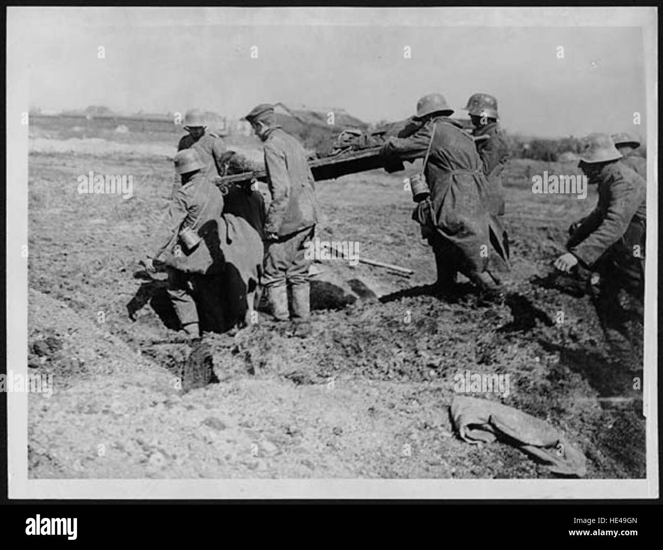 This historical image depicts a soldier, referred to as *Boche ...