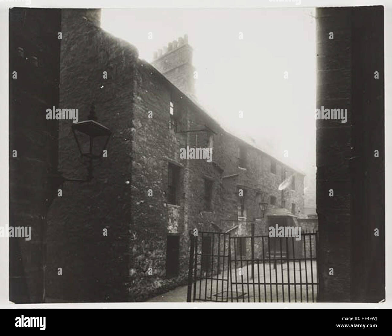 This image shows the back view of a two-storey building, highlighting ...