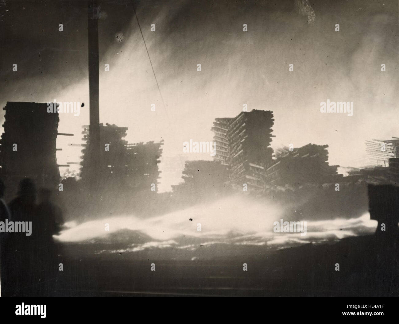 Stacks of Timber Ablaze Stock Photo - Alamy