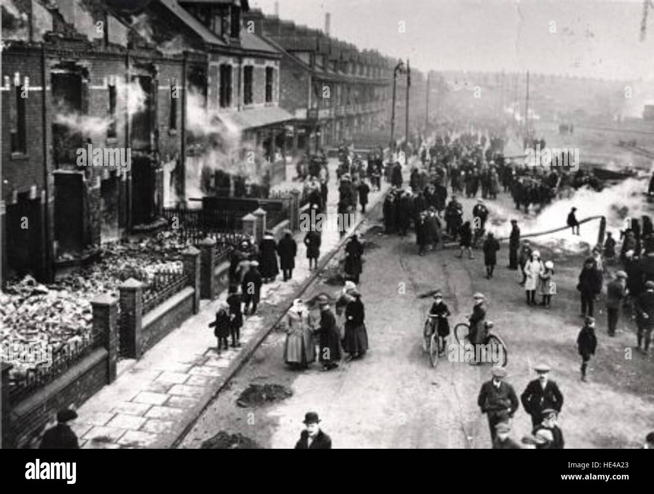 This image captures the aftermath of a timber yard fire, showcasing the ...