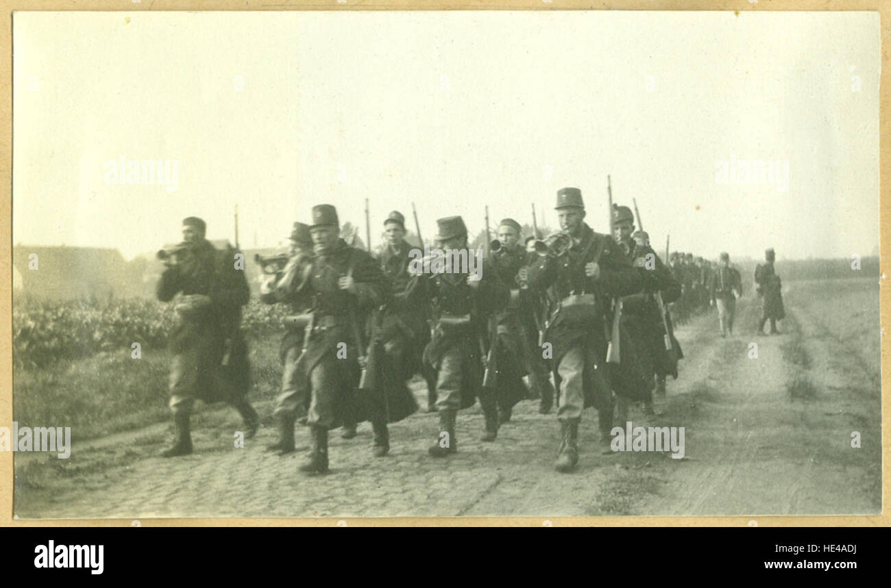 A historic image depicting a column of Belgian infantry from August ...