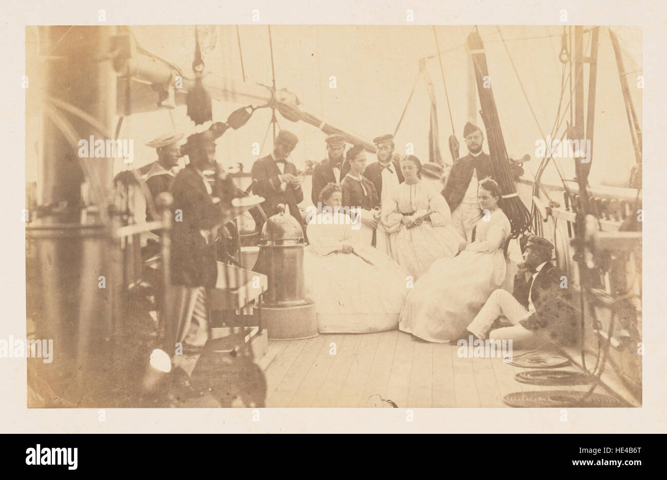 This historical image depicts French naval personnel aboard a ship ...