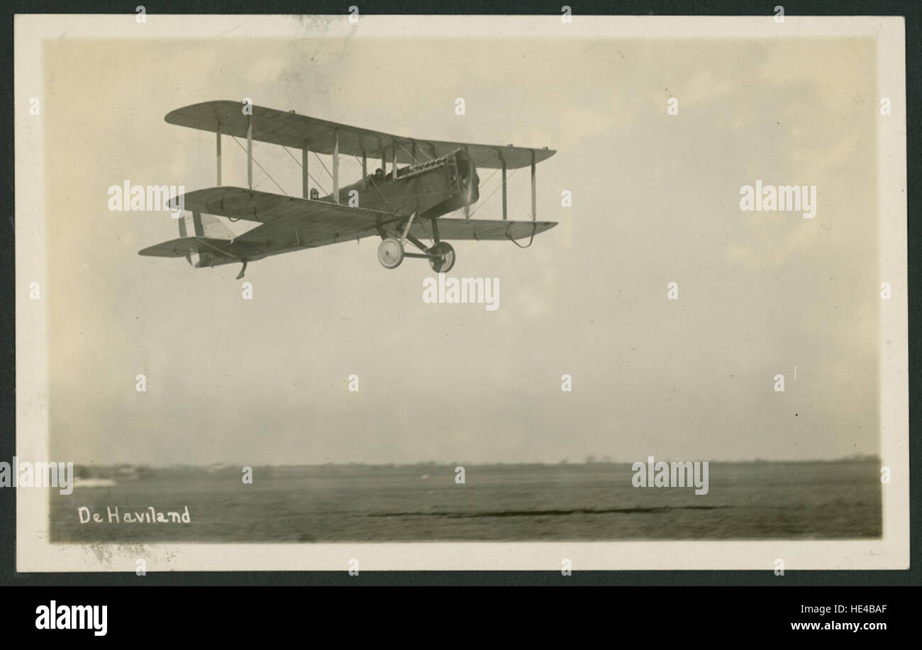 This historical image showcases a De Havilland DH.4 biplane, a ...
