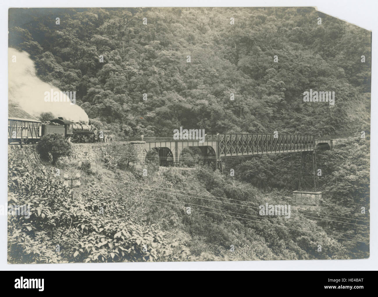 This historic image features a railroad bridge from the Ferrocarril ...