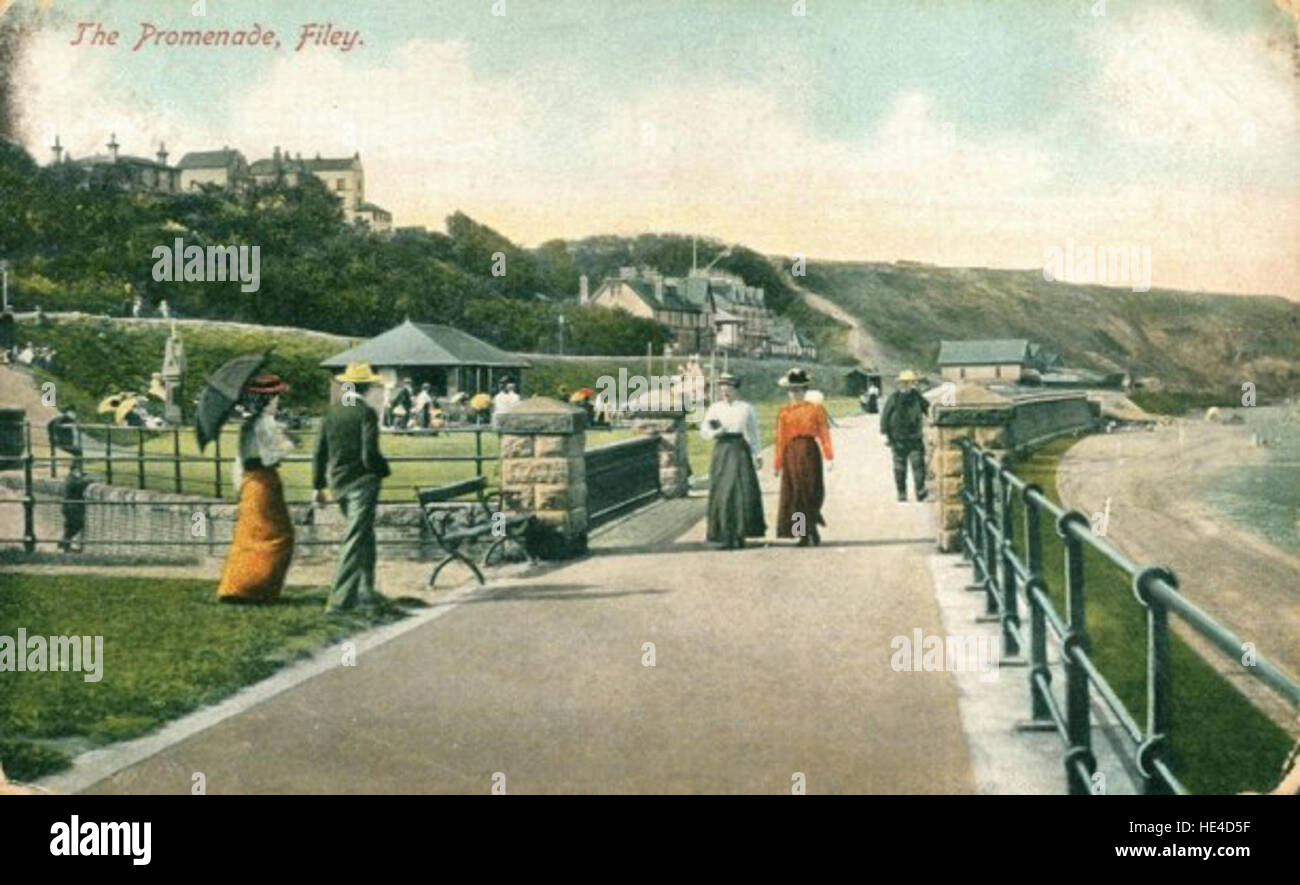 A vintage photograph of Filey Promenade in 1909, showing people walking ...