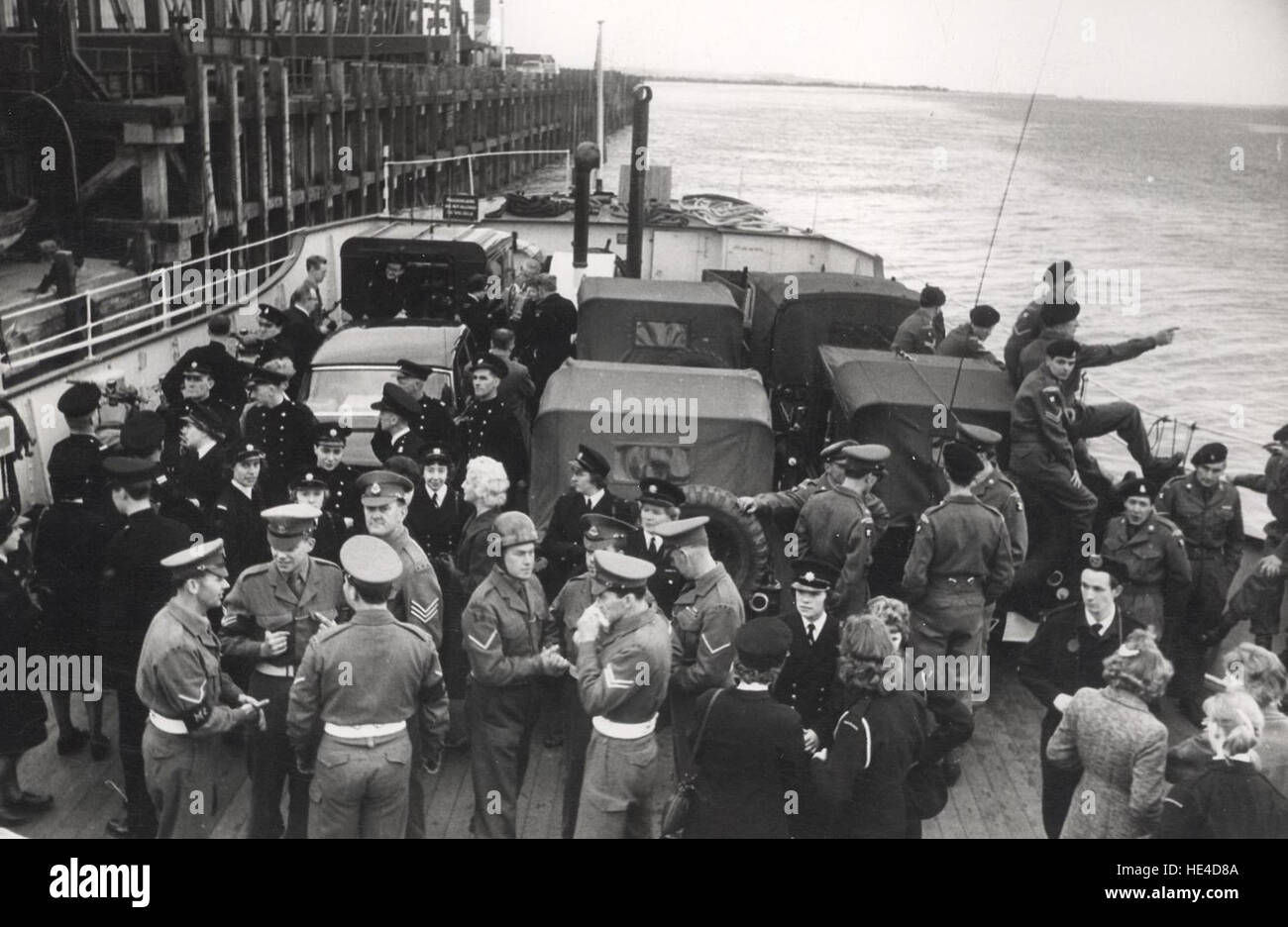 Civil defense personnel from Hull leaving on the Humber ferry, captured ...