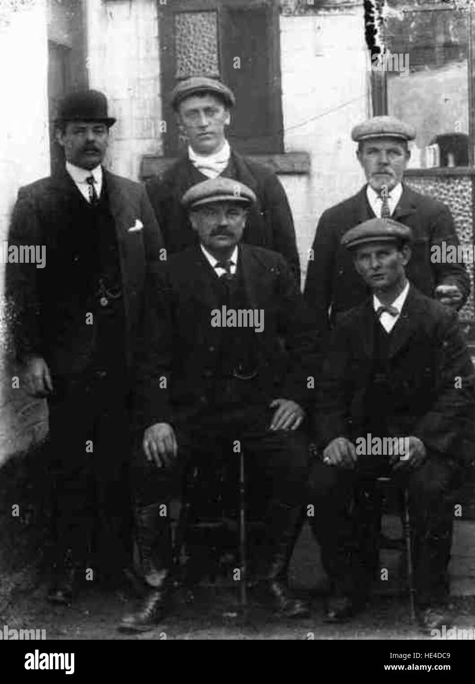 Group of men wearing flat caps, circa 1900, historical image Stock ...