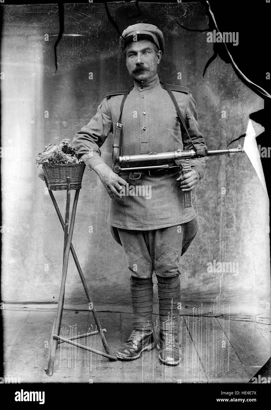 Russian soldier in uniform with MP40 submachine gun, World War II era ...