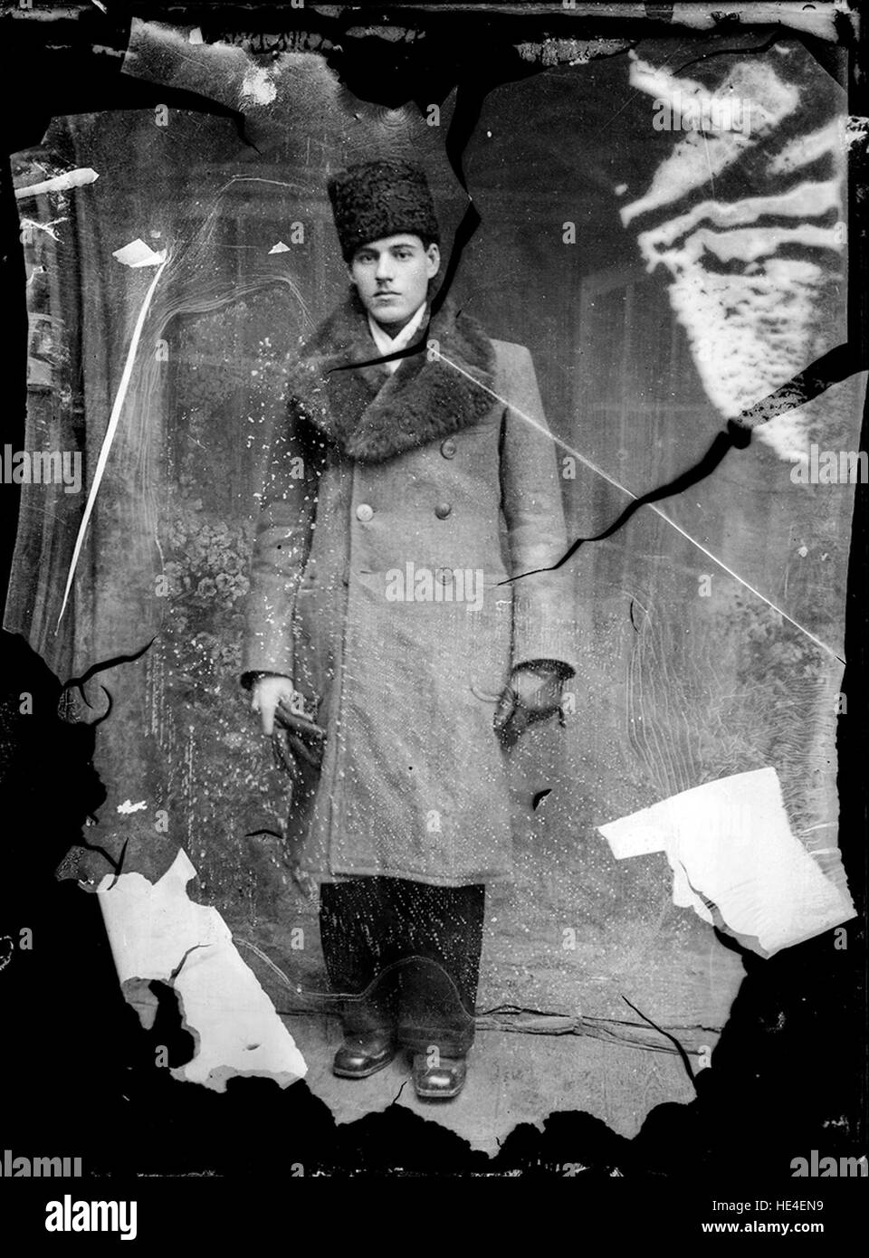 A photograph of a man wearing a traditional hat from Romania ...