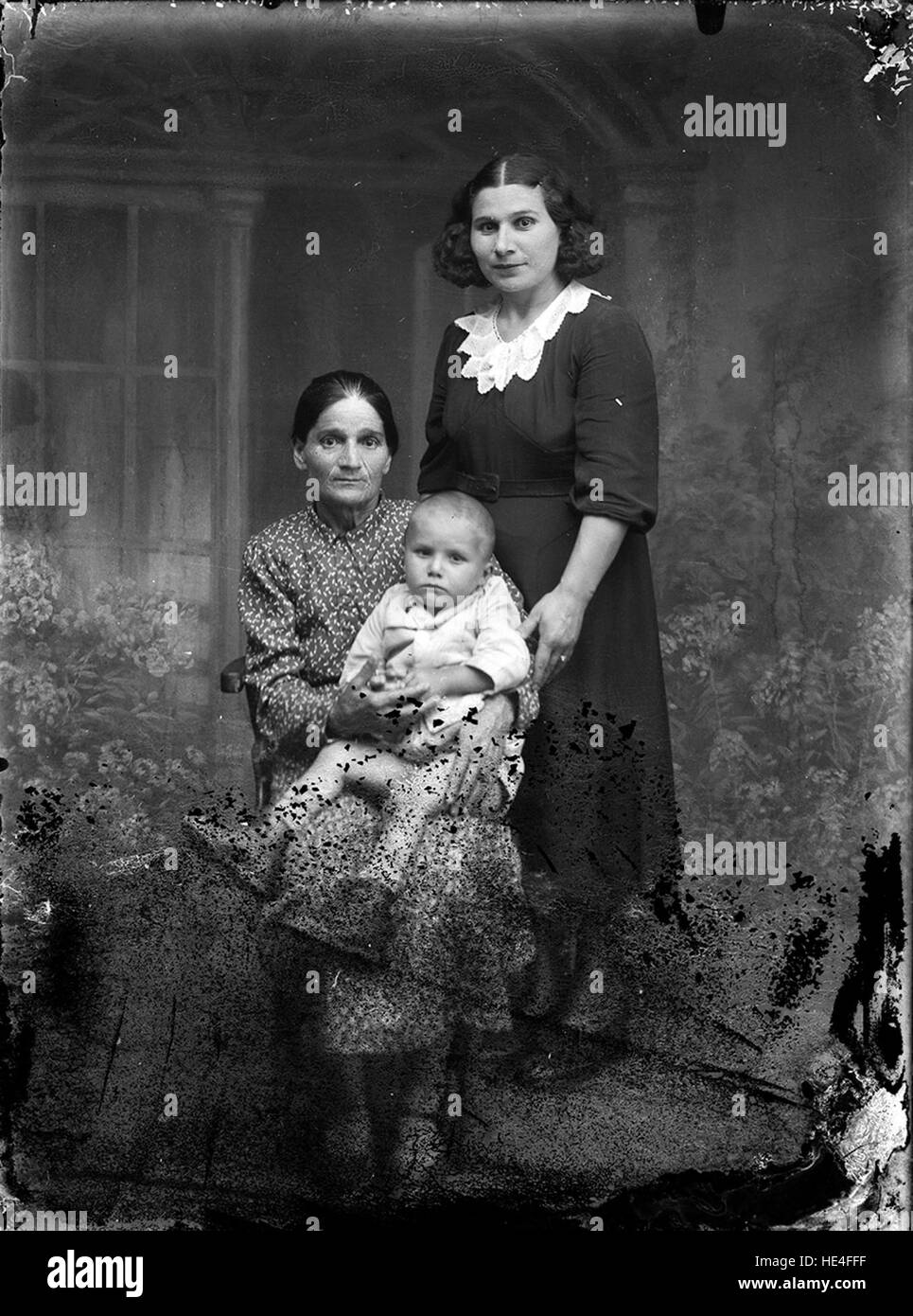 A family portrait captured on a glass plate, from the Costica Acsinte ...