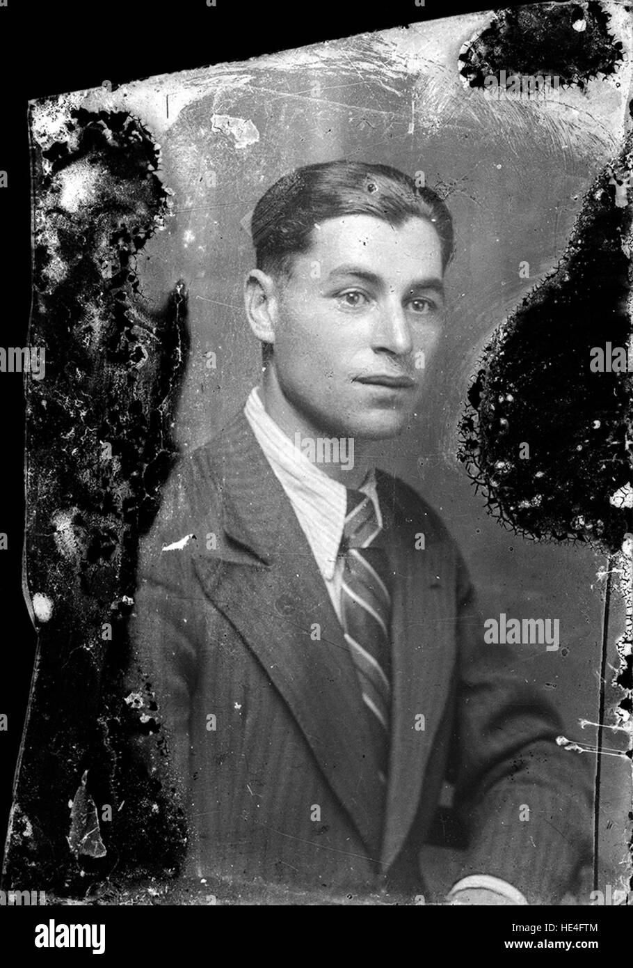 A portrait of a young man from early 20th-century Romania, captured on ...