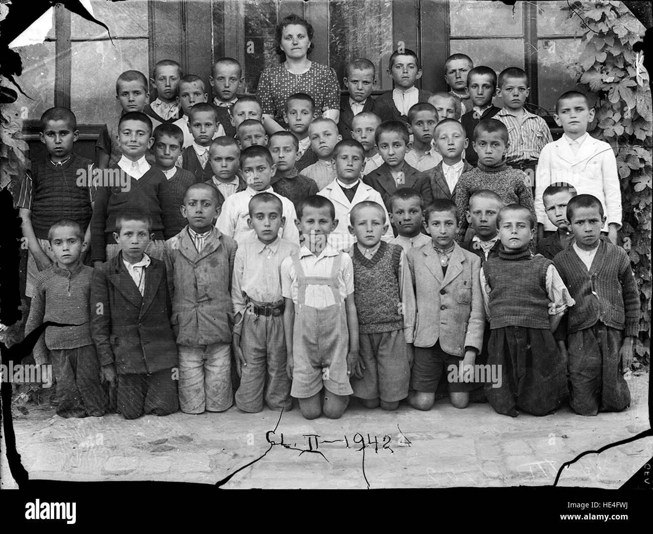 Boys with their second-grade teacher, 1942, historical photograph from ...