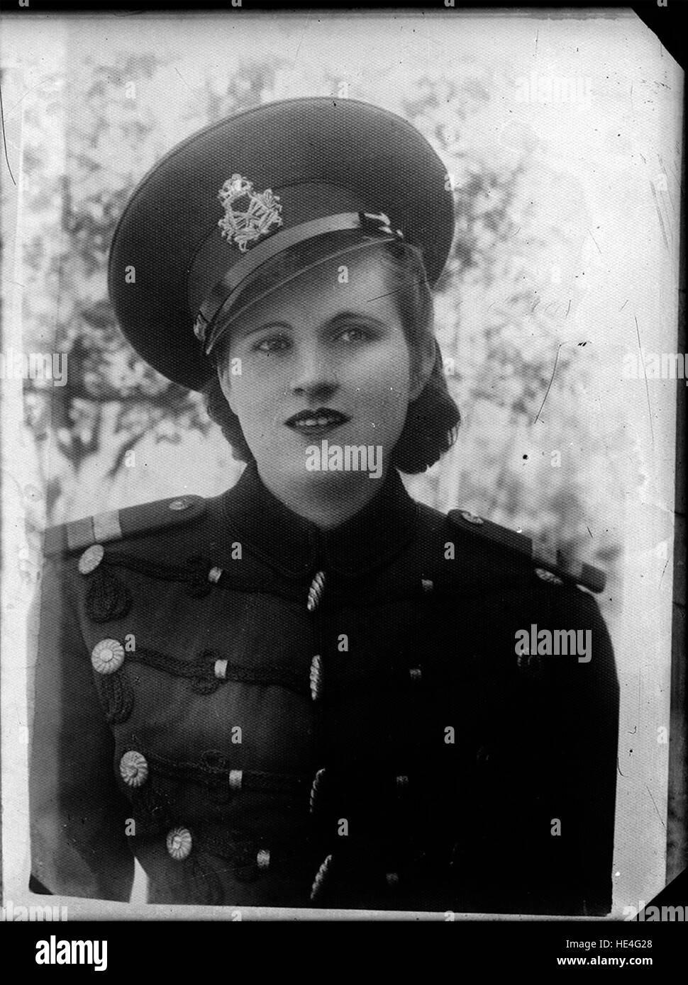 A woman in a cavalry platoon uniform, captured in a historical ...