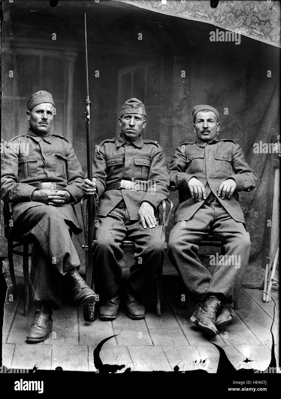 Three Romanian soldiers in the early 20th century, captured on a glass ...