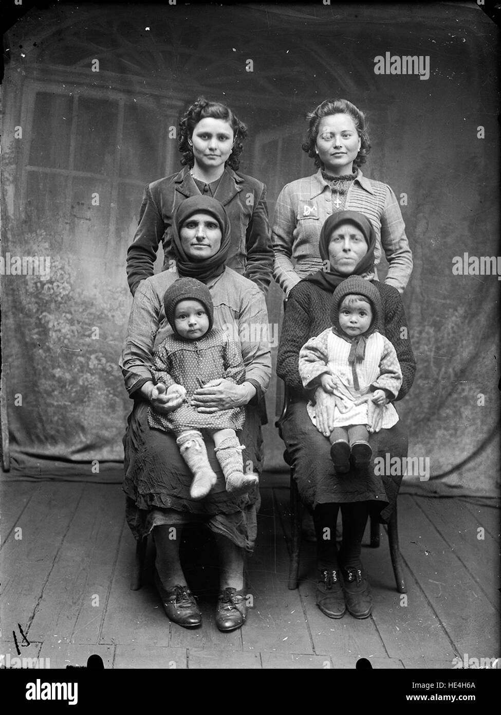 A family portrait showing two families, captured by Costica Acsinte on ...