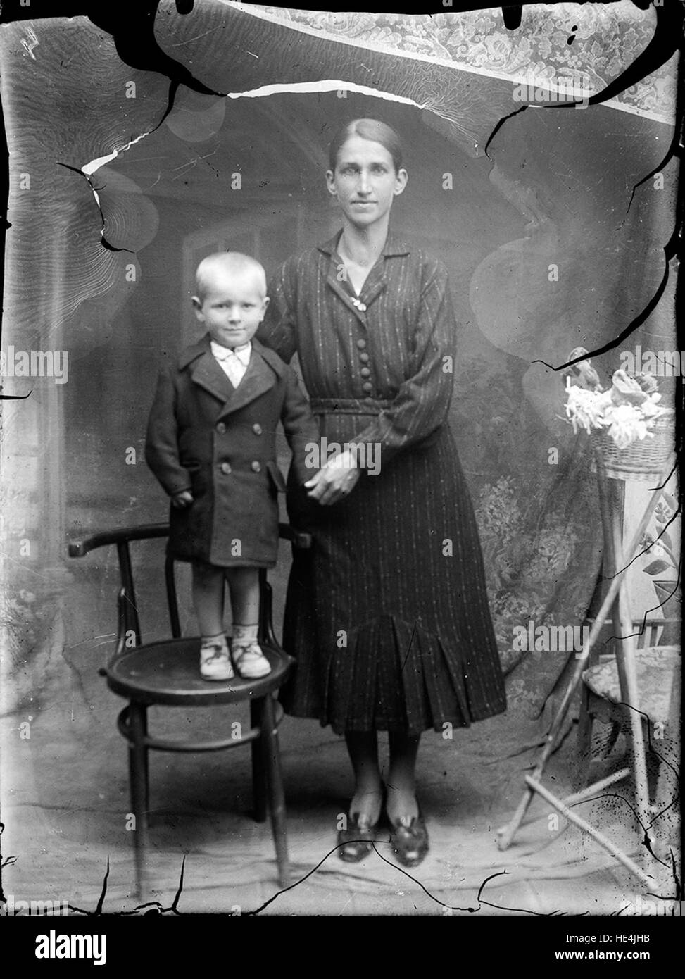 A historic photograph of a Romanian mother holding her child, taken by ...