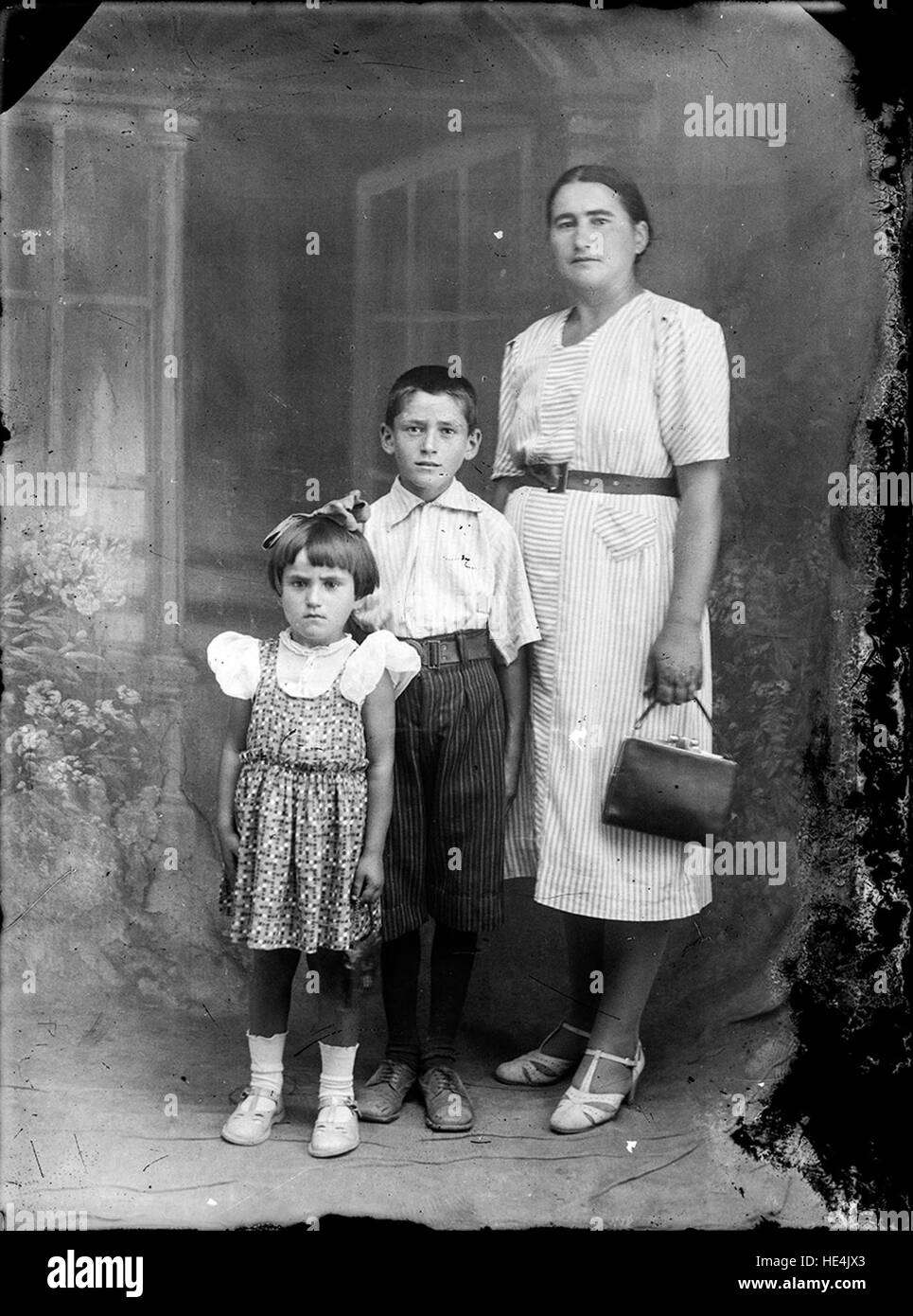 A vintage photograph of a mother with two children from Ialomita ...