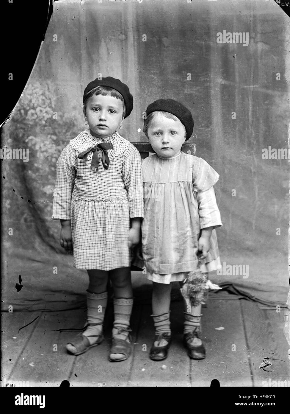 A glass plate photograph of two children from Ialomita, Romania, taken ...