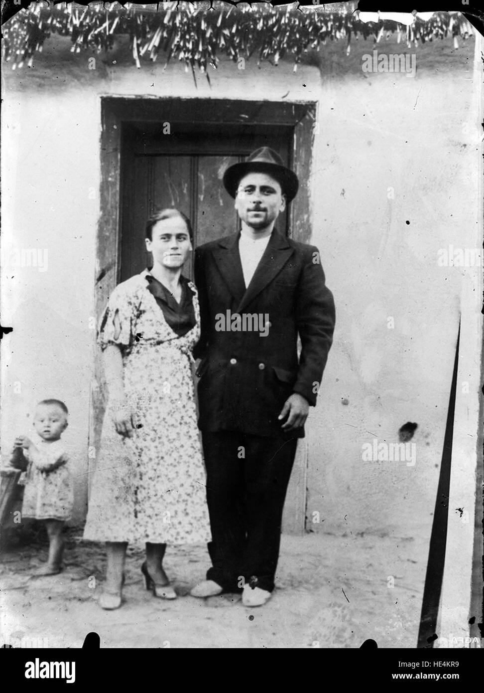 A reproduction of a historical family portrait taken on a glass plate ...