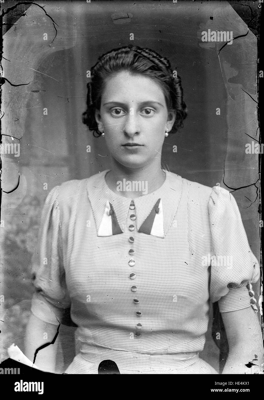 A portrait of a woman from Romania, captured in a negative glass plate ...