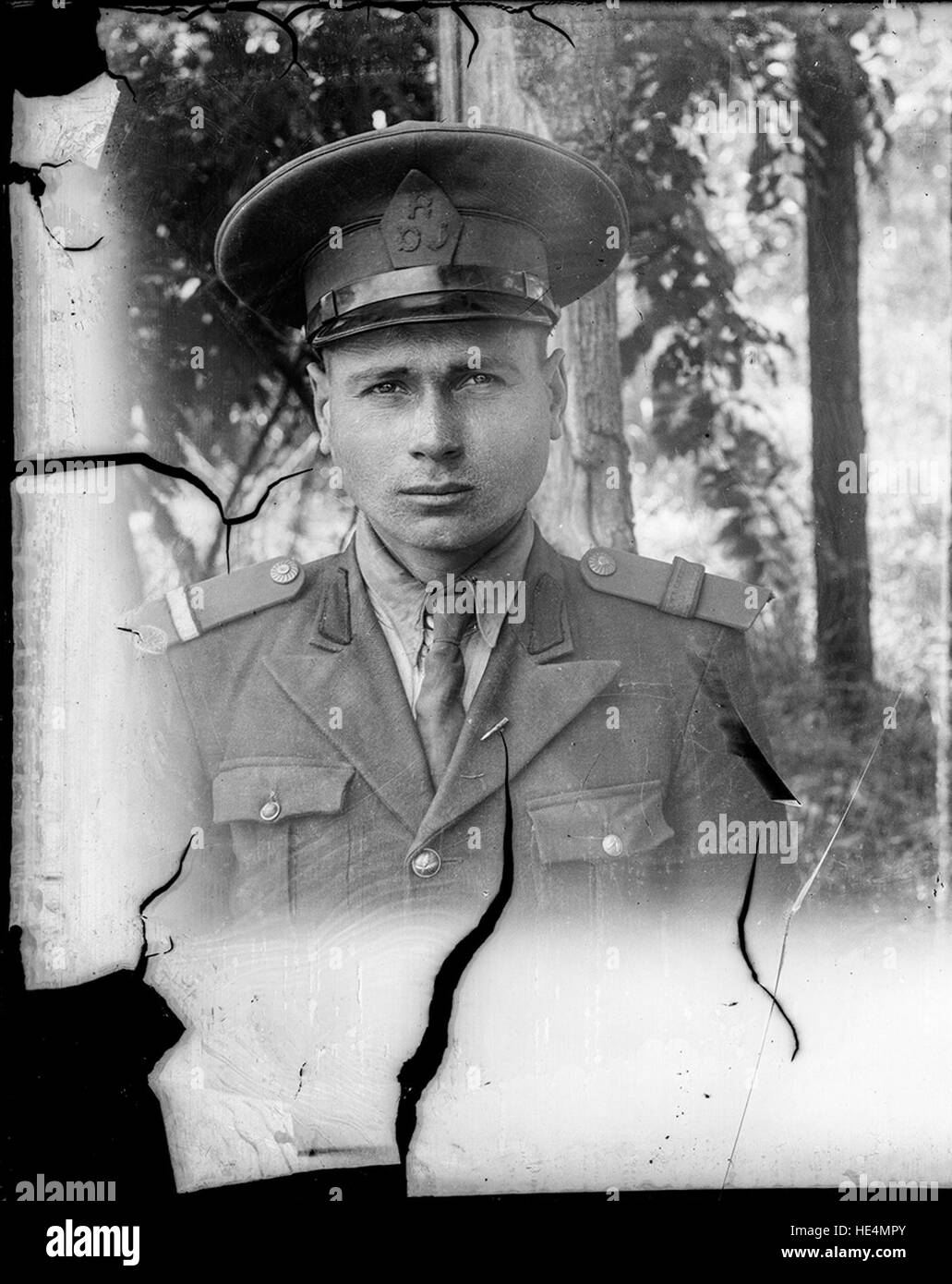 A photograph from the Costica Acsinte Archive featuring two portraits ...