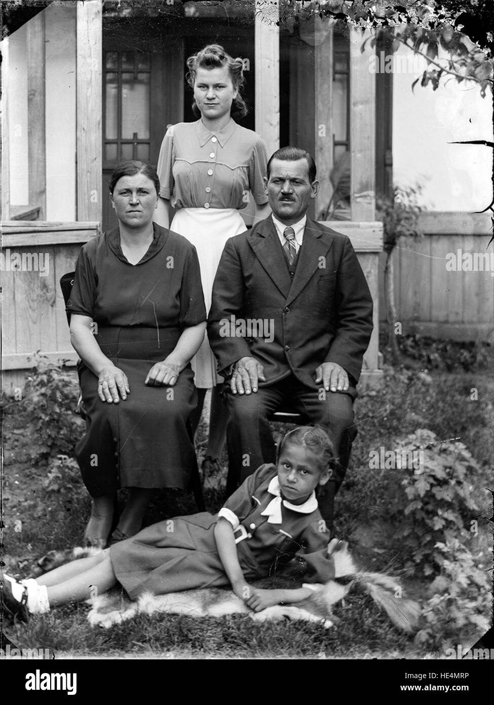 A vintage portrait of a Romanian family, captured in a glass plate ...
