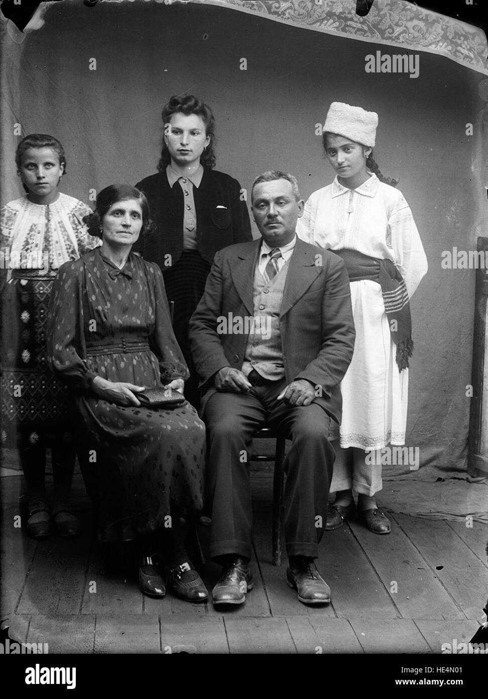 A historical family portrait from Romania, captured in glass plate ...